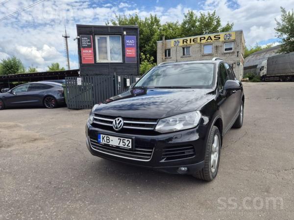 Melns Volkswagen Touareg 2010 Rīga, ar dzinēja tilpumu 3.00 L un nobraukumu 265 tūkst. km par 8490 €, foto 1 vietnē AUTOMOTO.COM.LV