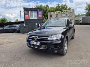 Black Volkswagen Touareg 2010 in Riga, with an engine capacity of 3.00 L and mileage of 265 thousand km for 8490 €, photo 5 on AUTOMOTO.COM.LV