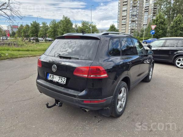 Melns Volkswagen Touareg 2010 Rīga, ar dzinēja tilpumu 3.00 L un nobraukumu 265 tūkst. km par 8490 €, foto 6 vietnē AUTOMOTO.COM.LV
