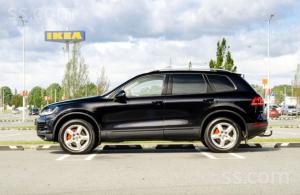 Black Volkswagen Touareg 2010 in Riga, with an engine capacity of 3.00 L and mileage of 265 thousand km for 7990 €, photo 6 on AUTOMOTO.COM.LV