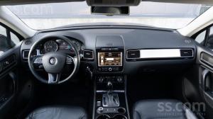 Black Volkswagen Touareg 2010 in Riga, with an engine capacity of 3.00 L and mileage of 265 thousand km for 7990 €, photo 13 on AUTOMOTO.COM.LV