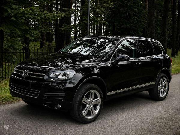 Black Volkswagen Touareg 2010 in Vilnius, with an engine capacity of 2.97 L and mileage of 252 thousand km for 10890 €, photo 6 on AUTOMOTO.COM.LV