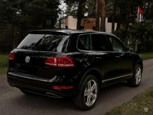 Melns Volkswagen Touareg 2010 Viļņa, ar dzinēja tilpumu 2.97 L un nobraukumu 252 tūkst. km par 10890 €, foto 12 vietnē AUTOMOTO.COM.LV