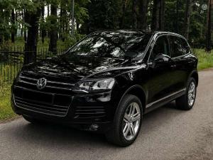 Black Volkswagen Touareg 2010 in Vilnius, with an engine capacity of 2.97 L and mileage of 252 thousand km for 10890 €, photo 6 on AUTOMOTO.COM.LV
