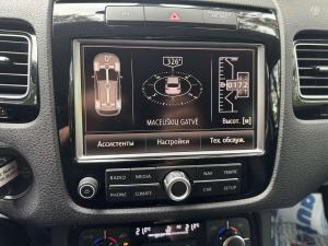 Black Volkswagen Touareg 2010 in Vilnius, with an engine capacity of 2.97 L and mileage of 252 thousand km for 10890 €, photo 21 on AUTOMOTO.COM.LV