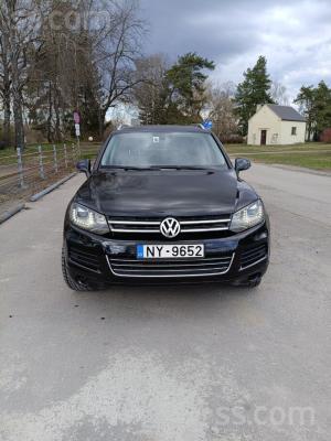 Black Volkswagen Touareg 2010 in Riga, with an engine capacity of 3.00 L and mileage of 420 thousand km for 8700 €, photo  on AUTOMOTO.COM.LV