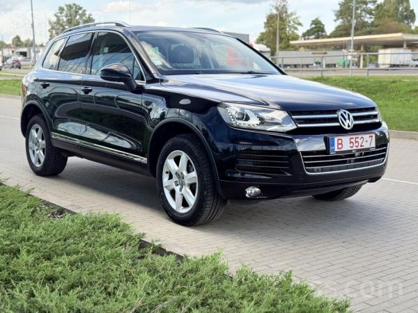 Black Volkswagen Touareg 2010 in Rezekne, with an engine capacity of 3.00 L and mileage of 326 thousand km for 10950 €, photo 4 on AUTOMOTO.COM.LV