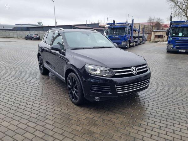 Black Volkswagen Touareg 2010 in Taurage, with an engine capacity of 2.97 L and mileage of 276 thousand km for 10000 €, photo 1 on AUTOMOTO.COM.LV