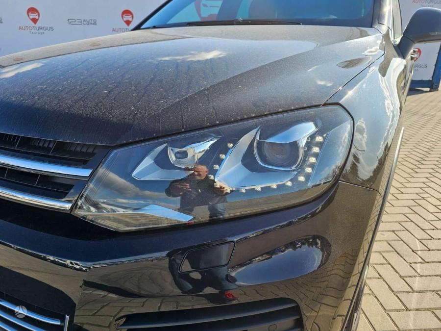 Black Volkswagen Touareg 2010 in Taurage, with an engine capacity of 2.97 L and mileage of 276 thousand km for 10000 €, photo 21 on AUTOMOTO.COM.LV