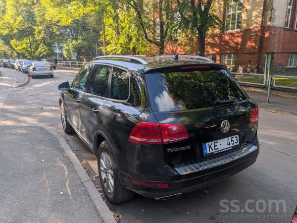 Melns Volkswagen Touareg 2010 Rīga, ar dzinēja tilpumu 3.00 L un nobraukumu 355 tūkst. km par 10500 €, foto 4 vietnē AUTOMOTO.COM.LV