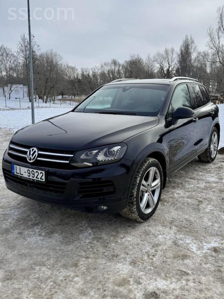 Melns Volkswagen Touareg 2010 Liepāja, ar dzinēja tilpumu 3.00 L un nobraukumu 348 tūkst. km par 10290 €, foto 1 vietnē AUTOMOTO.COM.LV