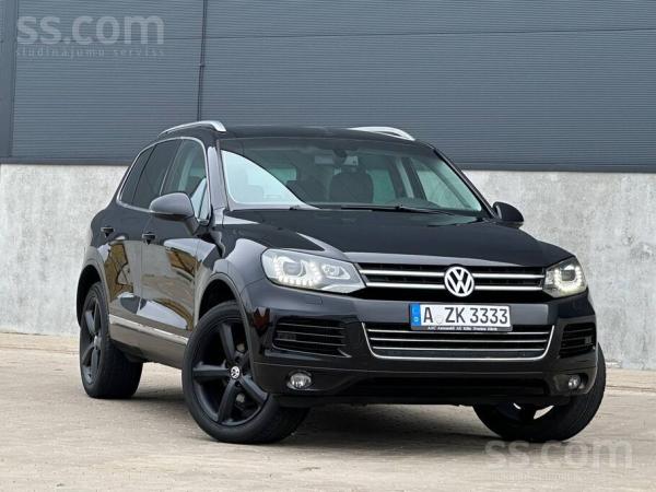 Black Volkswagen Touareg 2011 in Riga, with an engine capacity of 3.00 L and mileage of 0 thousand km for 10900 €, photo 1 on AUTOMOTO.COM.LV