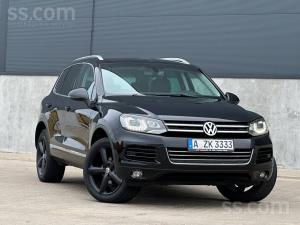 Melns Volkswagen Touareg 2011 Rīga, ar dzinēja tilpumu 3.00 L un nobraukumu 0 tūkst. km par 10900 €, foto 1 vietnē AUTOMOTO.COM.LV