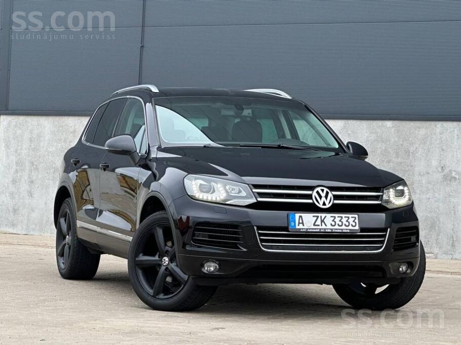 Melns Volkswagen Touareg 2011 Rīga, ar dzinēja tilpumu 3.00 L un nobraukumu 0 tūkst. km par 10900 €, foto 1 vietnē AUTOMOTO.COM.LV