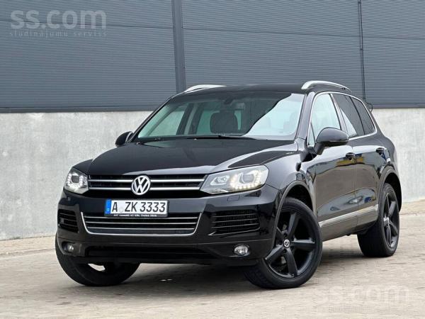 Black Volkswagen Touareg 2011 in Riga, with an engine capacity of 3.00 L and mileage of 0 thousand km for 10900 €, photo 3 on AUTOMOTO.COM.LV