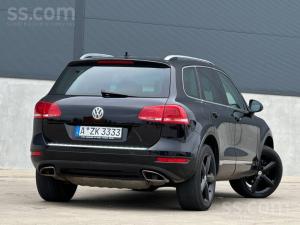 Melns Volkswagen Touareg 2011 Rīga, ar dzinēja tilpumu 3.00 L un nobraukumu 0 tūkst. km par 10900 €, foto 4 vietnē AUTOMOTO.COM.LV