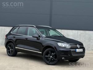 Melns Volkswagen Touareg 2011 Rīga, ar dzinēja tilpumu 3.00 L un nobraukumu 0 tūkst. km par 10900 €, foto 5 vietnē AUTOMOTO.COM.LV