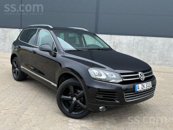 Black Volkswagen Touareg 2011 in Riga, with an engine capacity of 3.00 L and mileage of 0 thousand km for 10900 €, photo 10 on AUTOMOTO.COM.LV