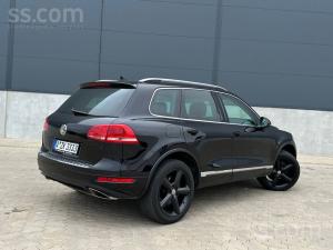 Melns Volkswagen Touareg 2011 Rīga, ar dzinēja tilpumu 3.00 L un nobraukumu 0 tūkst. km par 10900 €, foto 12 vietnē AUTOMOTO.COM.LV