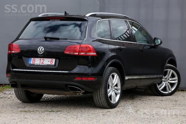 Melns Volkswagen Touareg 2011 Tukums, ar dzinēja tilpumu 3.00 L un nobraukumu 243 tūkst. km par 10990 €, foto 2 vietnē AUTOMOTO.COM.LV