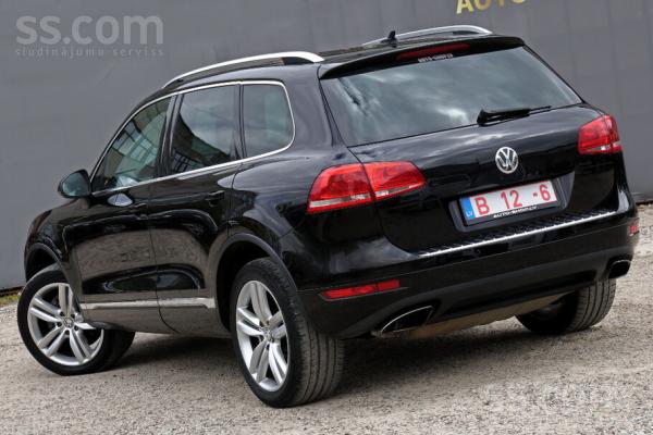 Melns Volkswagen Touareg 2011 Tukums, ar dzinēja tilpumu 3.00 L un nobraukumu 243 tūkst. km par 10990 €, foto 4 vietnē AUTOMOTO.COM.LV