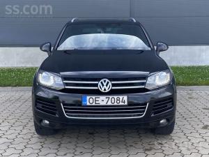 Black Volkswagen Touareg 2011 in Riga, with an engine capacity of 3.00 L and mileage of 218 thousand km for 12990 €, photo 5 on AUTOMOTO.COM.LV