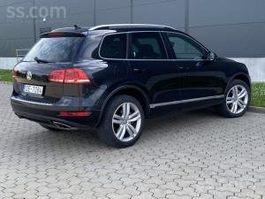 Black Volkswagen Touareg 2011 in Riga, with an engine capacity of 3.00 L and mileage of 218 thousand km for 12990 €, photo 6 on AUTOMOTO.COM.LV