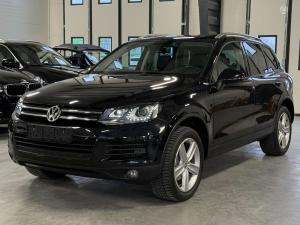 Black Volkswagen Touareg 2011 in Marijampole, with an engine capacity of 2.97 L and mileage of 211 thousand km for 11999 €, photo 4 on AUTOMOTO.COM.LV