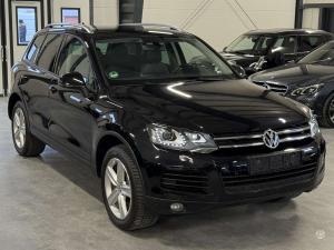 Black Volkswagen Touareg 2011 in Marijampole, with an engine capacity of 2.97 L and mileage of 211 thousand km for 11999 €, photo 8 on AUTOMOTO.COM.LV