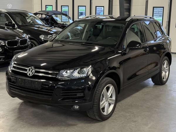 Black Volkswagen Touareg 2011 in Marijampole, with an engine capacity of 2.97 L and mileage of 211 thousand km for 11999 €, photo 9 on AUTOMOTO.COM.LV