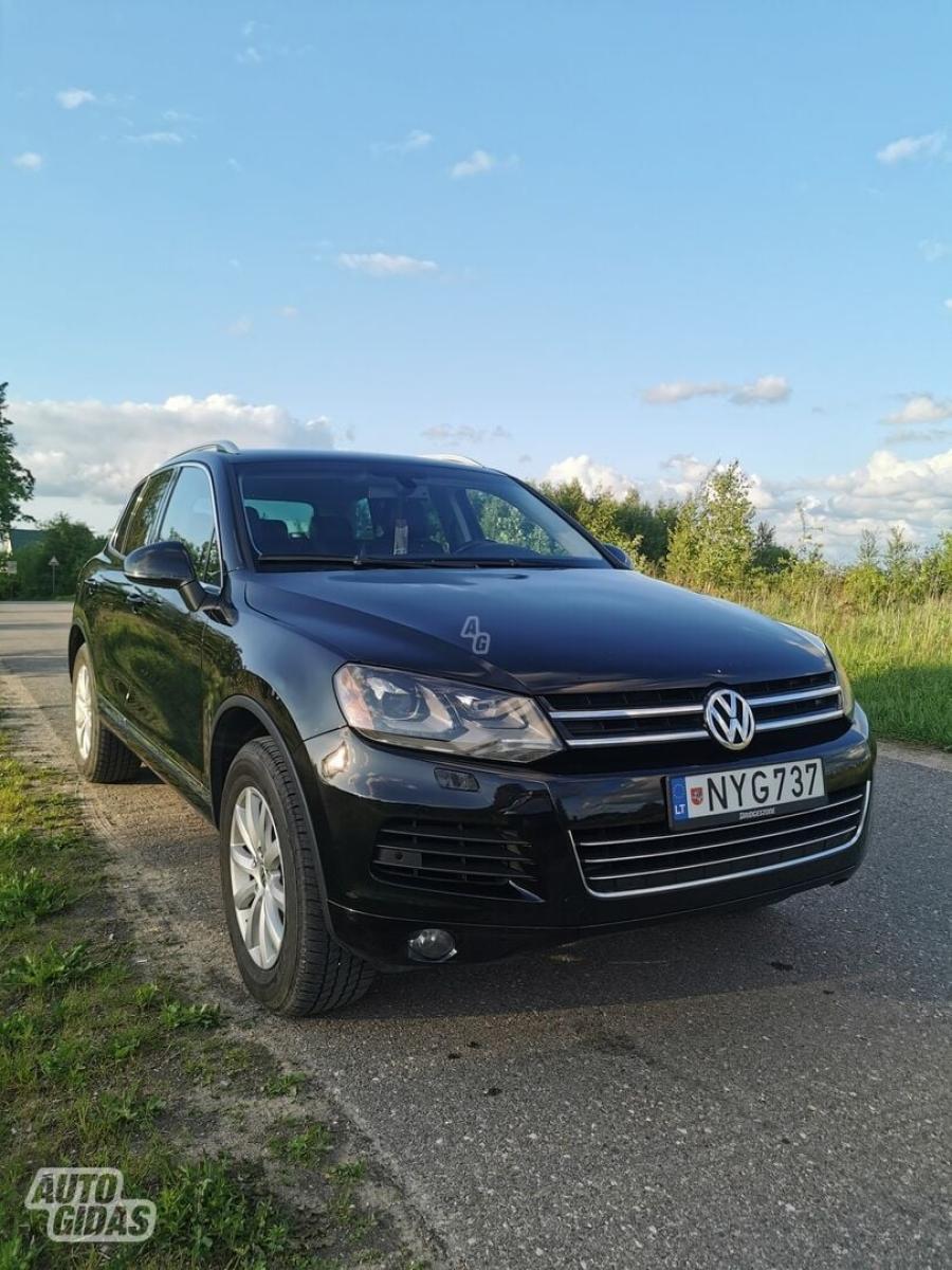 Black Volkswagen Touareg 2011 in Vilnius, with an engine capacity of 3.60 L and mileage of 222 thousand km for 7600 €, photo 1 on AUTOMOTO.COM.LV