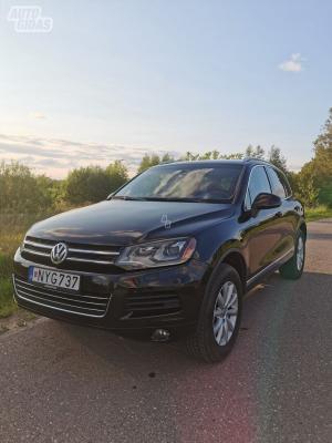 Black Volkswagen Touareg 2011 in Vilnius, with an engine capacity of 3.60 L and mileage of 222 thousand km for 7600 €, photo 2 on AUTOMOTO.COM.LV