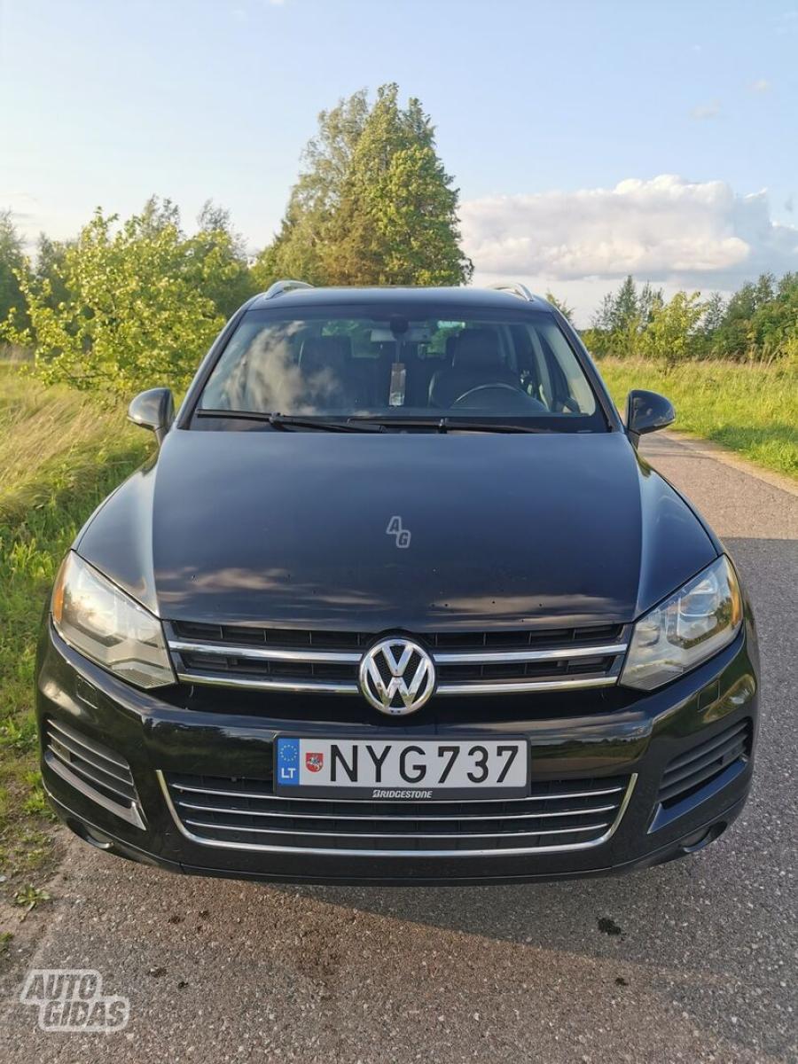 Black Volkswagen Touareg 2011 in Vilnius, with an engine capacity of 3.60 L and mileage of 222 thousand km for 7600 €, photo 3 on AUTOMOTO.COM.LV
