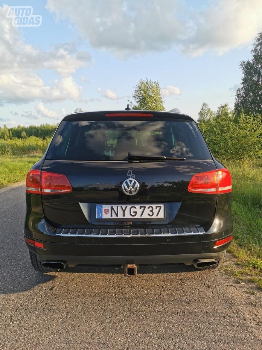 Black Volkswagen Touareg 2011 in Vilnius, with an engine capacity of 3.60 L and mileage of 222 thousand km for 7600 €, photo 5 on AUTOMOTO.COM.LV