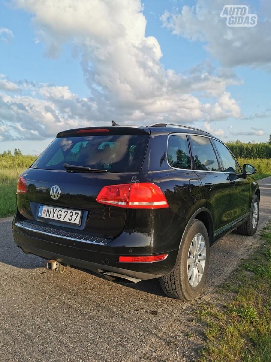 Black Volkswagen Touareg 2011 in Vilnius, with an engine capacity of 3.60 L and mileage of 222 thousand km for 7600 €, photo 7 on AUTOMOTO.COM.LV