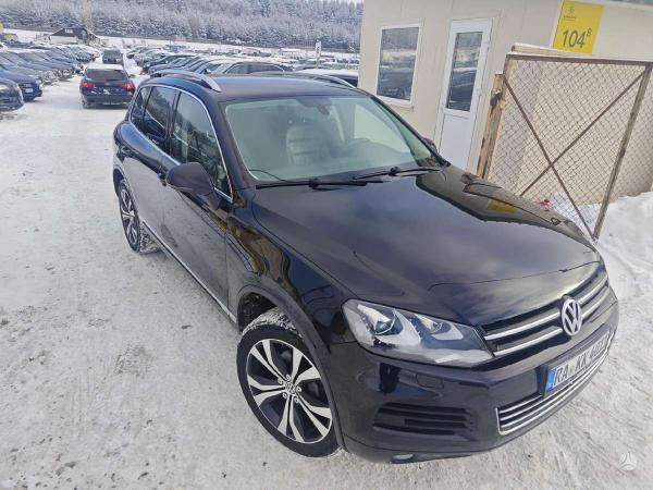 Black Volkswagen Touareg 2011 in Vilnius, with an engine capacity of 2.97 L and mileage of 240 thousand km for 10990 €, photo 5 on AUTOMOTO.COM.LV