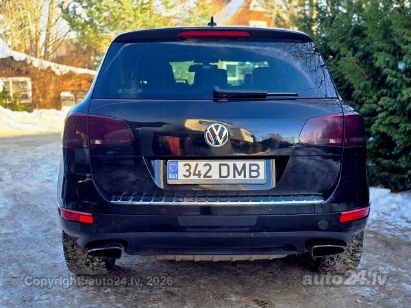 Black Volkswagen Touareg 2011 in Tallinn, with an engine capacity of 3.00 L and mileage of 274 thousand km for 9990 €, photo 5 on AUTOMOTO.COM.LV