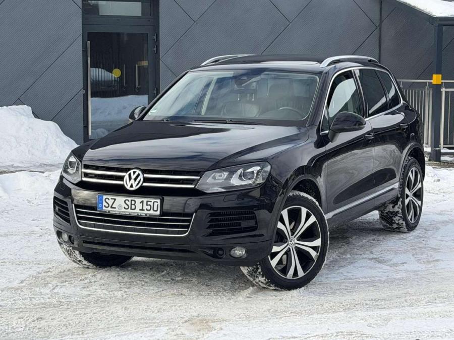 Black Volkswagen Touareg 2011 in Jonava, with an engine capacity of 4.13 L and mileage of 285 thousand km for 12350 €, photo 2 on AUTOMOTO.COM.LV