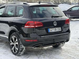 Black Volkswagen Touareg 2011 in Jonava, with an engine capacity of 4.13 L and mileage of 285 thousand km for 12350 €, photo 7 on AUTOMOTO.COM.LV