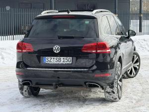 Black Volkswagen Touareg 2011 in Jonava, with an engine capacity of 4.13 L and mileage of 285 thousand km for 12350 €, photo 9 on AUTOMOTO.COM.LV