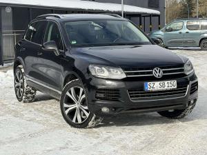Black Volkswagen Touareg 2011 in Jonava, with an engine capacity of 4.13 L and mileage of 285 thousand km for 12350 €, photo 12 on AUTOMOTO.COM.LV