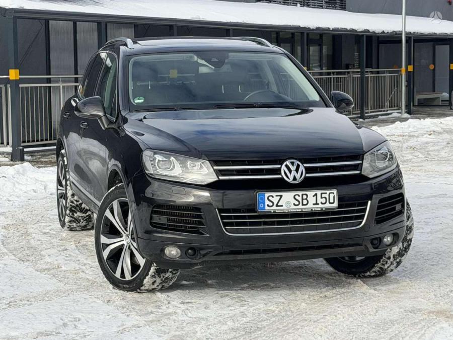 Black Volkswagen Touareg 2011 in Jonava, with an engine capacity of 4.13 L and mileage of 285 thousand km for 12350 €, photo 13 on AUTOMOTO.COM.LV