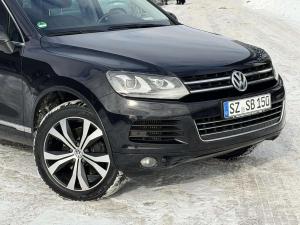 Black Volkswagen Touareg 2011 in Jonava, with an engine capacity of 4.13 L and mileage of 285 thousand km for 12350 €, photo 14 on AUTOMOTO.COM.LV