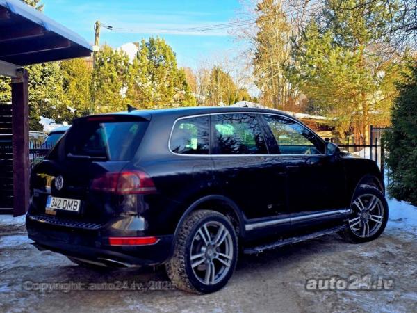 Melns Volkswagen Touareg 2011 Tallina, ar dzinēja tilpumu 3.00 L un nobraukumu 274 tūkst. km par 8590 €, foto 6 vietnē AUTOMOTO.COM.LV