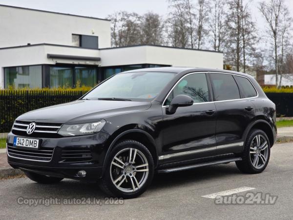 Melns Volkswagen Touareg 2011 Tallina, ar dzinēja tilpumu 3.00 L un nobraukumu 276 tūkst. km par 7990 €, foto 1 vietnē AUTOMOTO.COM.LV