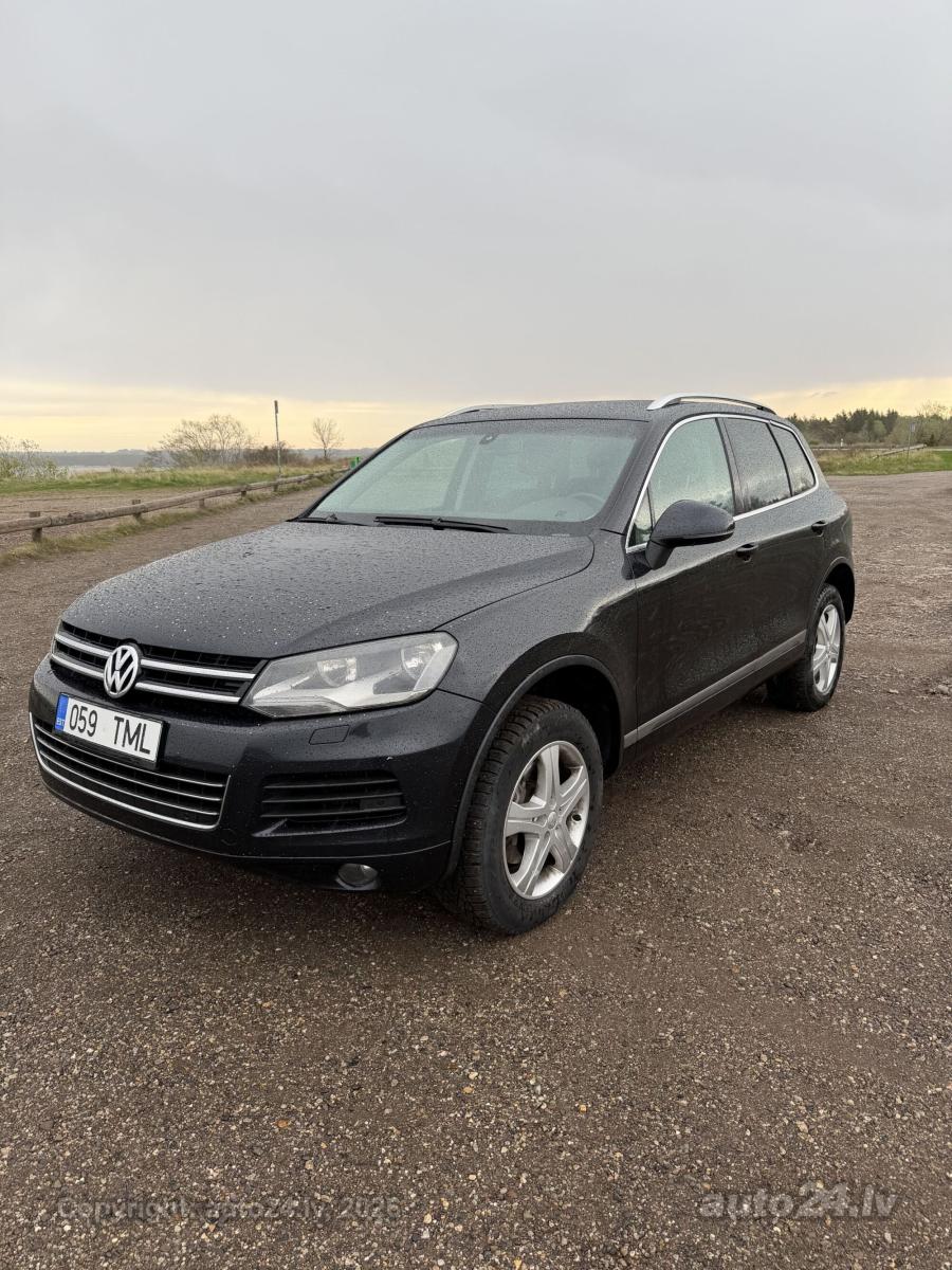 Black Volkswagen Touareg 2011 in Tallinn, with an engine capacity of 3.00 L and mileage of 357 thousand km for 6500 €, photo 3 on AUTOMOTO.COM.LV