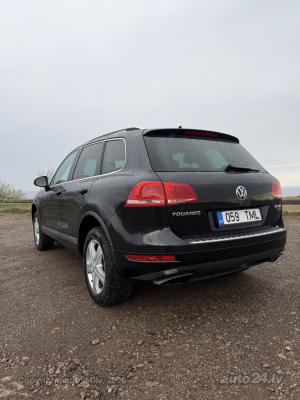 Black Volkswagen Touareg 2011 in Tallinn, with an engine capacity of 3.00 L and mileage of 357 thousand km for 6500 €, photo 11 on AUTOMOTO.COM.LV