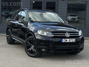 Melns Volkswagen Touareg 2011 Jelgava, ar dzinēja tilpumu 3.00 L un nobraukumu 325 tūkst. km par 12600 €, foto 1 vietnē AUTOMOTO.COM.LV