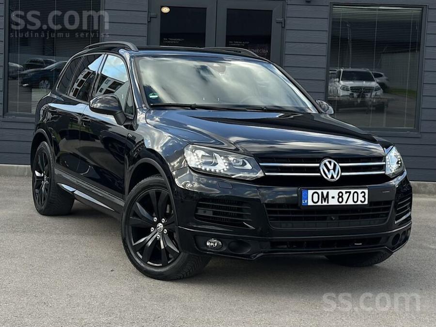 Melns Volkswagen Touareg 2011 Jelgava, ar dzinēja tilpumu 3.00 L un nobraukumu 325 tūkst. km par 12600 €, foto 1 vietnē AUTOMOTO.COM.LV