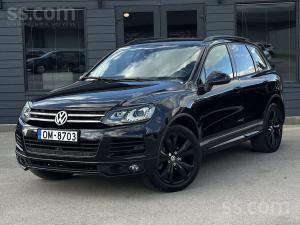 Melns Volkswagen Touareg 2011 Jelgava, ar dzinēja tilpumu 3.00 L un nobraukumu 325 tūkst. km par 12600 €, foto 4 vietnē AUTOMOTO.COM.LV